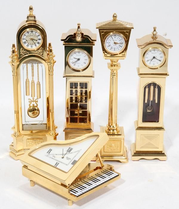 Realized price for BULOVA MINIATURE BRASS CLOCKS FOURTEEN