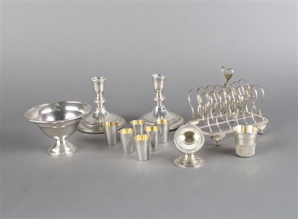 Realized price for A Collection of Silver Articles,